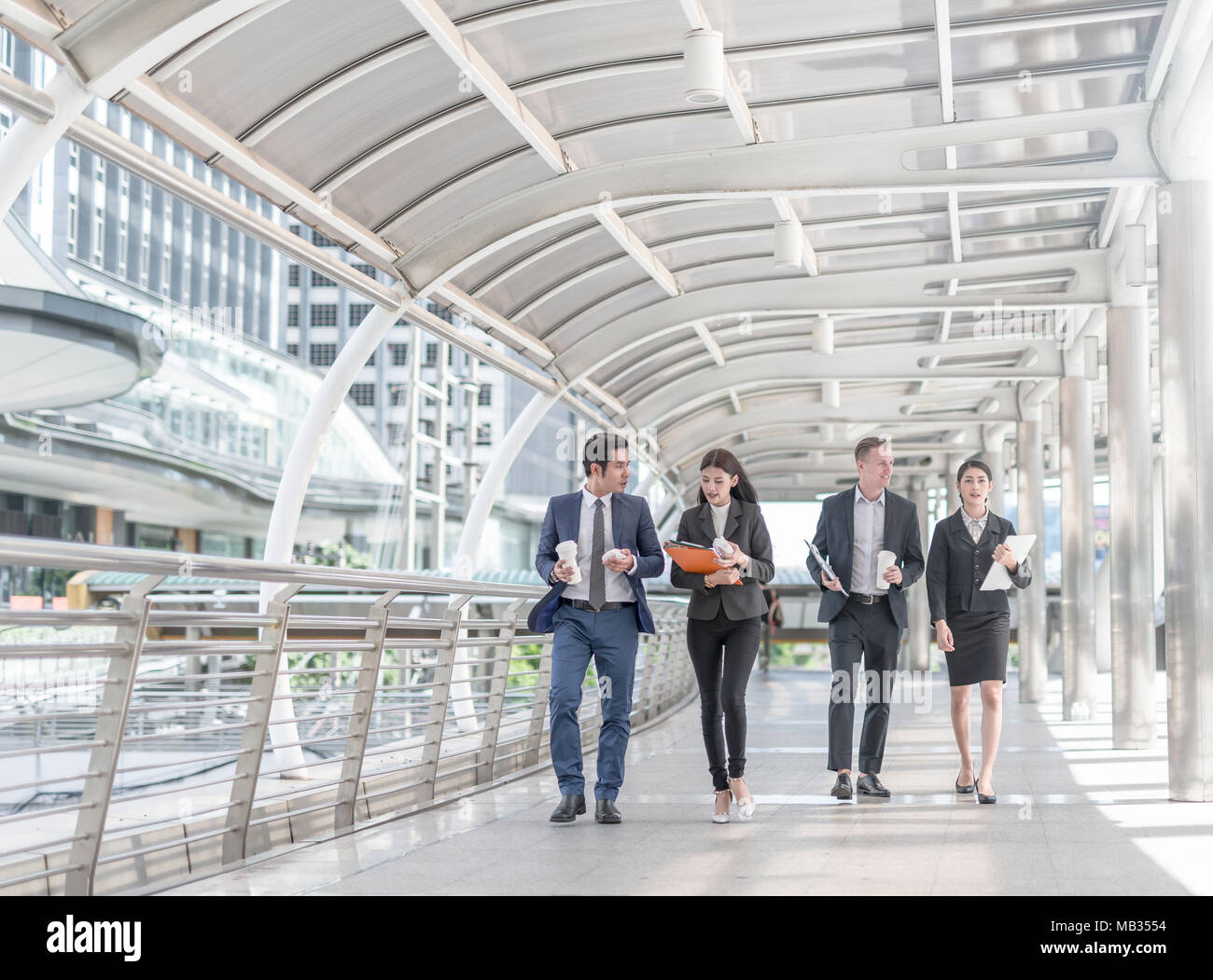 Female professionals walking hi-res stock photography and images - Alamy