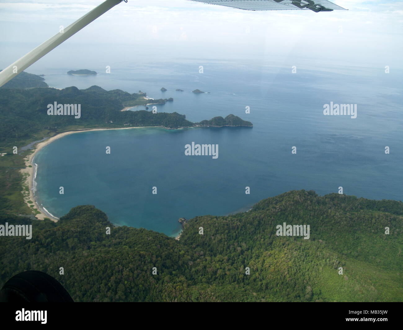 Aerial view of Indian Ocean and Aceh Jaya land from airplane Stock ...