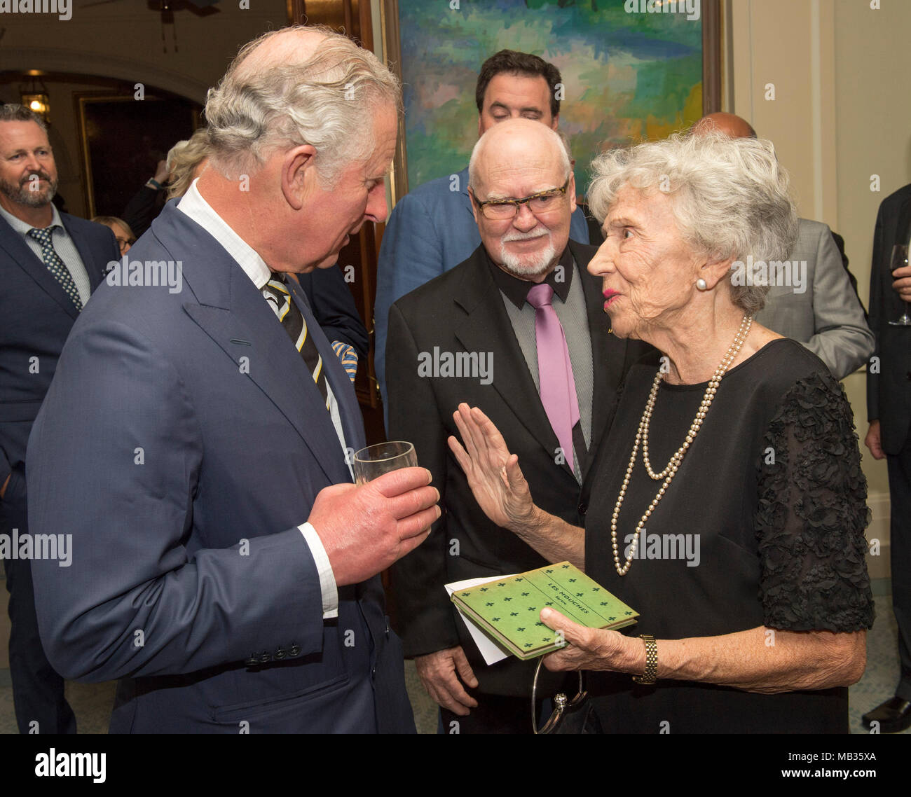 The Prince of Wales (left) talks to his former French teacher Dr Janet ...