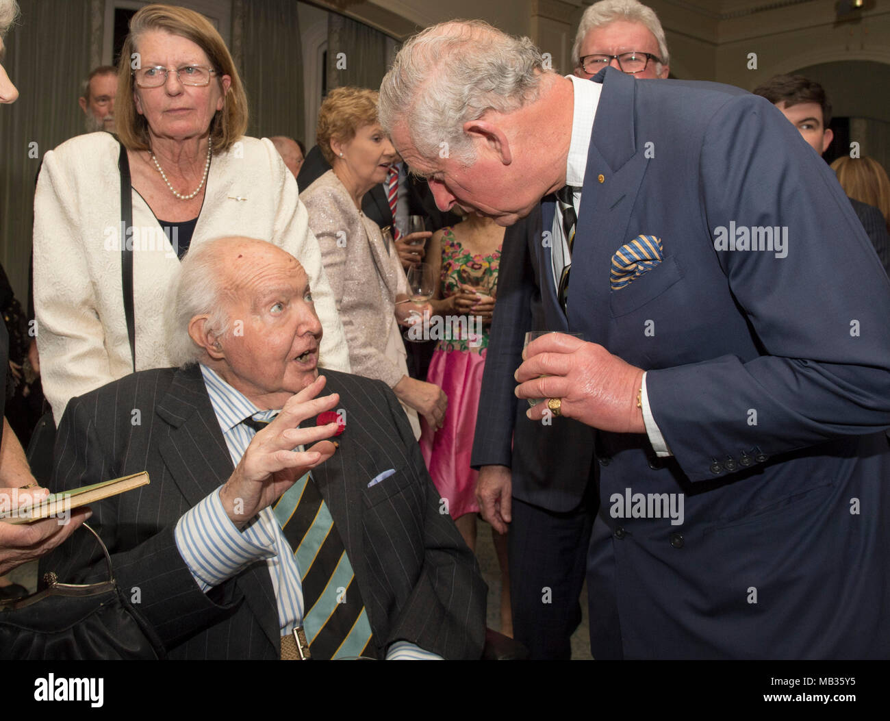 The Prince of Wales (right) talks to his former History teacher Michael ...