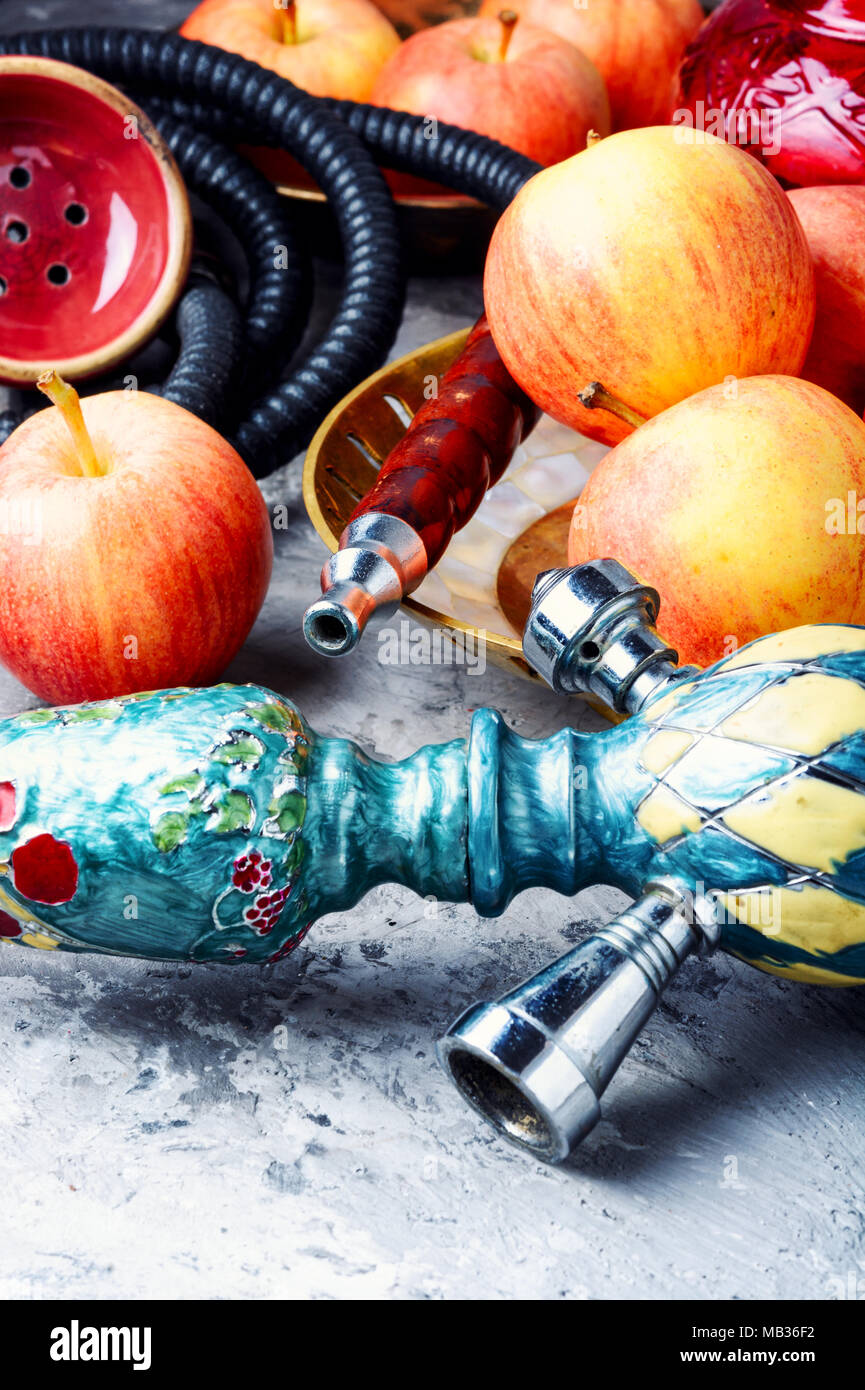 Smoke hookah with red apple.Shisha concept.Hookah concept Stock Photo ...