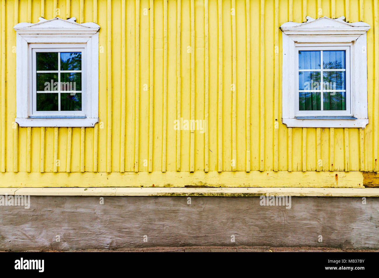 Old windows on a aged wooden wall. Architectural detail. Architecture ...