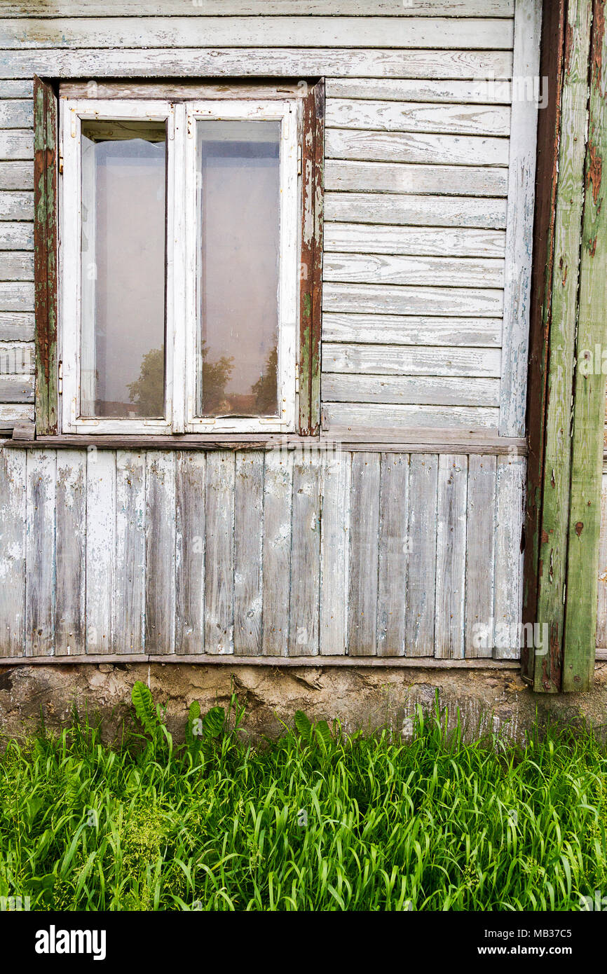 Old window on a aged wooden wall. Architectural detail. Architecture ...