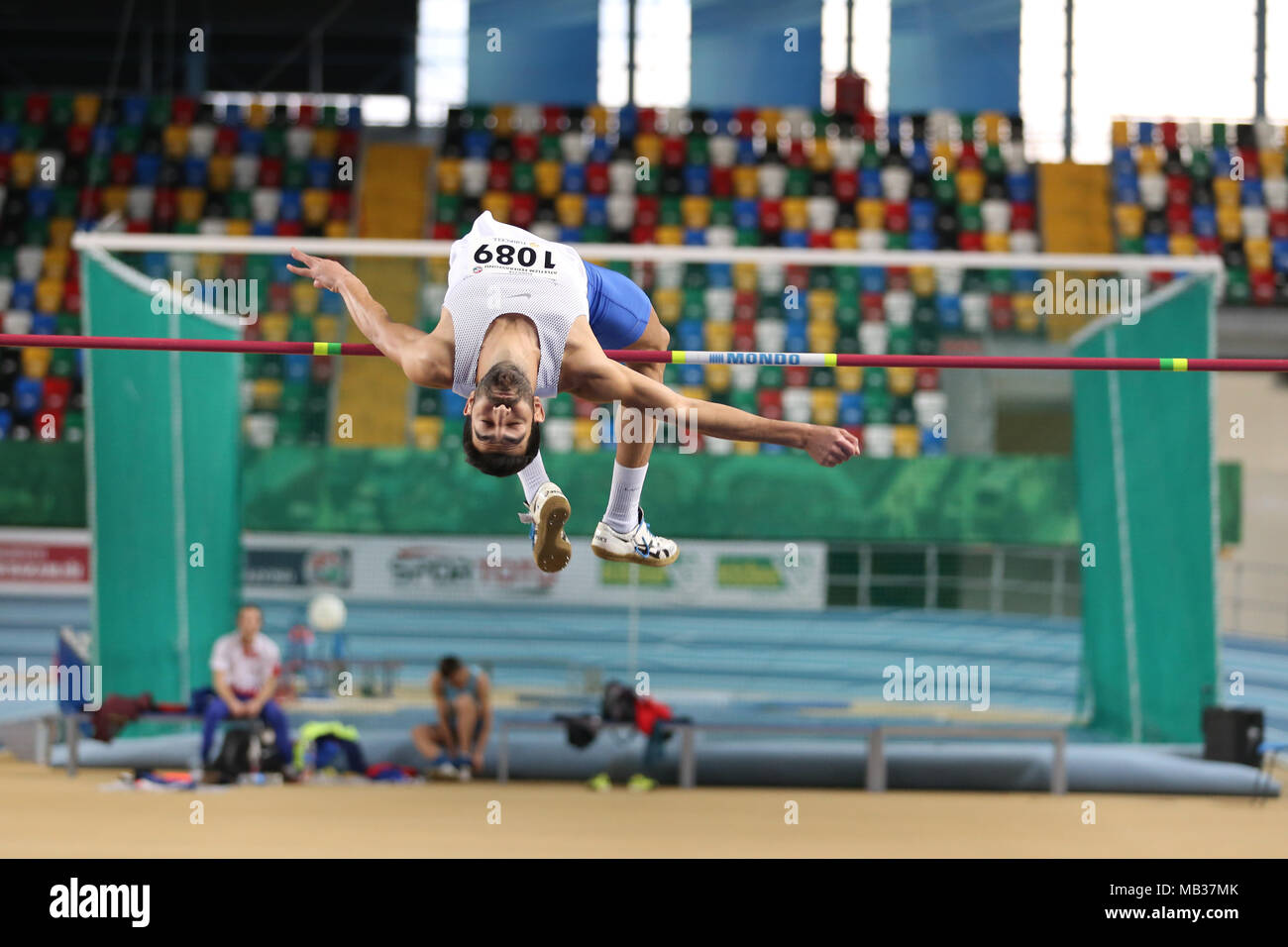 ISTANBUL, TURKEY - DECEMBER 23, 2017: Undefined athlete high jumping ...