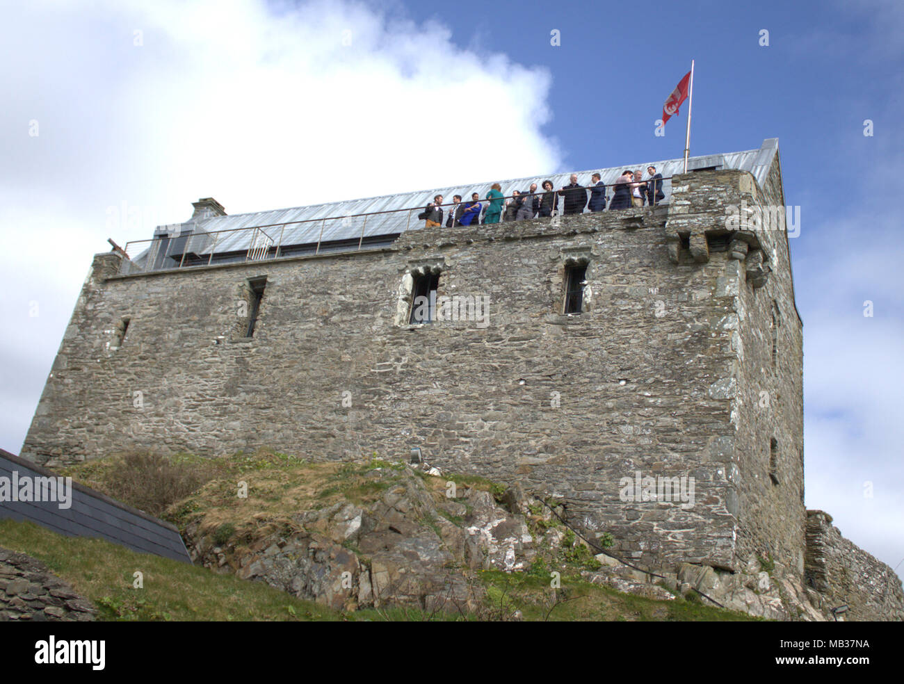 wedding party enjoying after wedding drinks on the ramparts of Dun na ...
