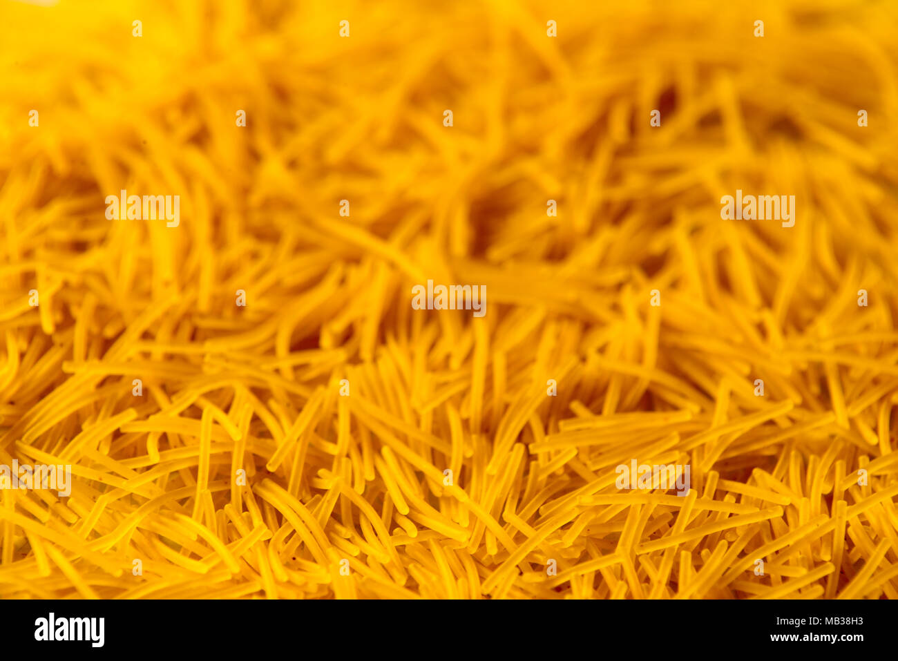 A handful of short and thin noodles Stock Photo - Alamy