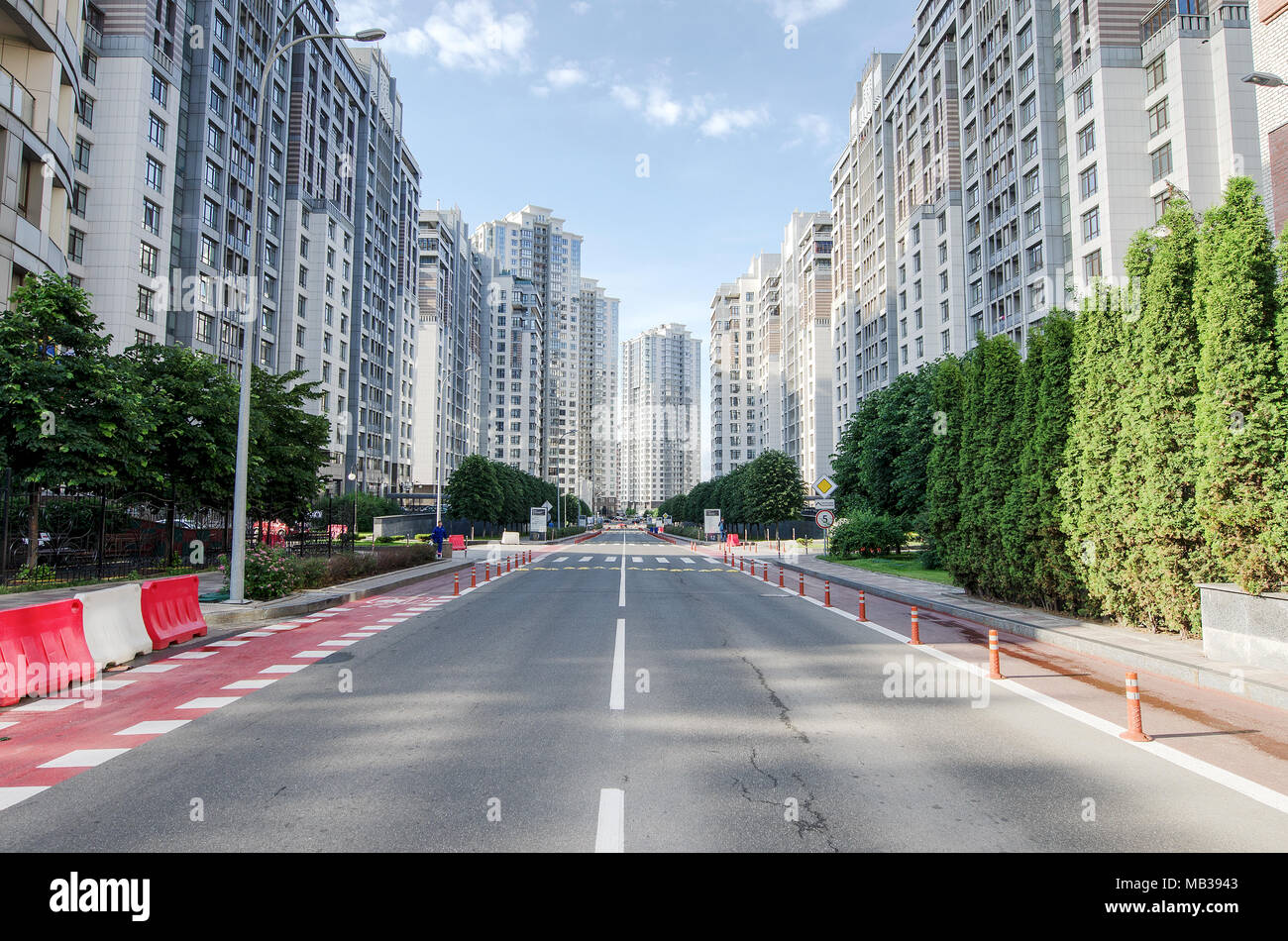 Daytime and nighttime photos at new successful district. High buildings ...