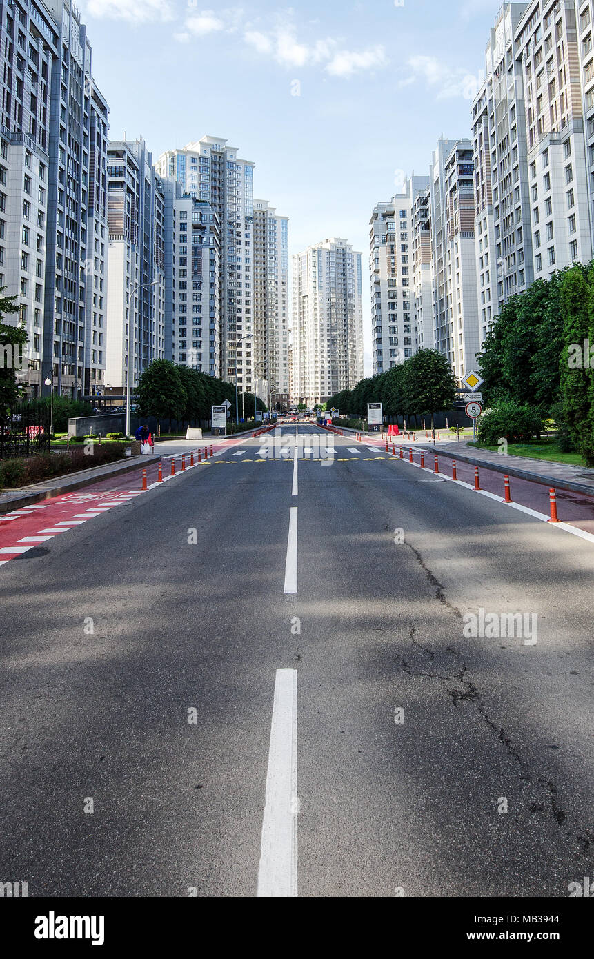 Daytime and nighttime photos at new successful district. High buildings ...