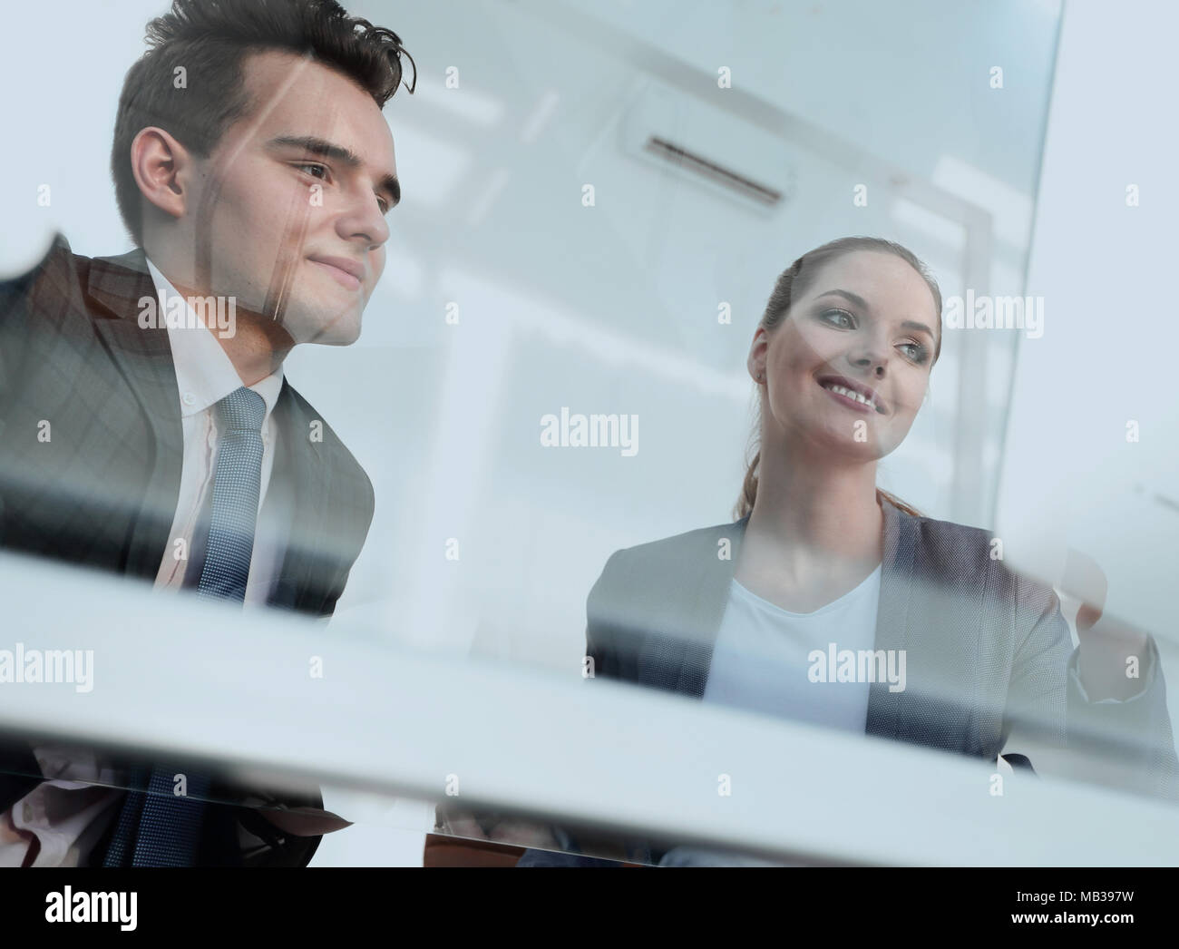 business concept.colleagues looking at computer screen Stock Photo - Alamy
