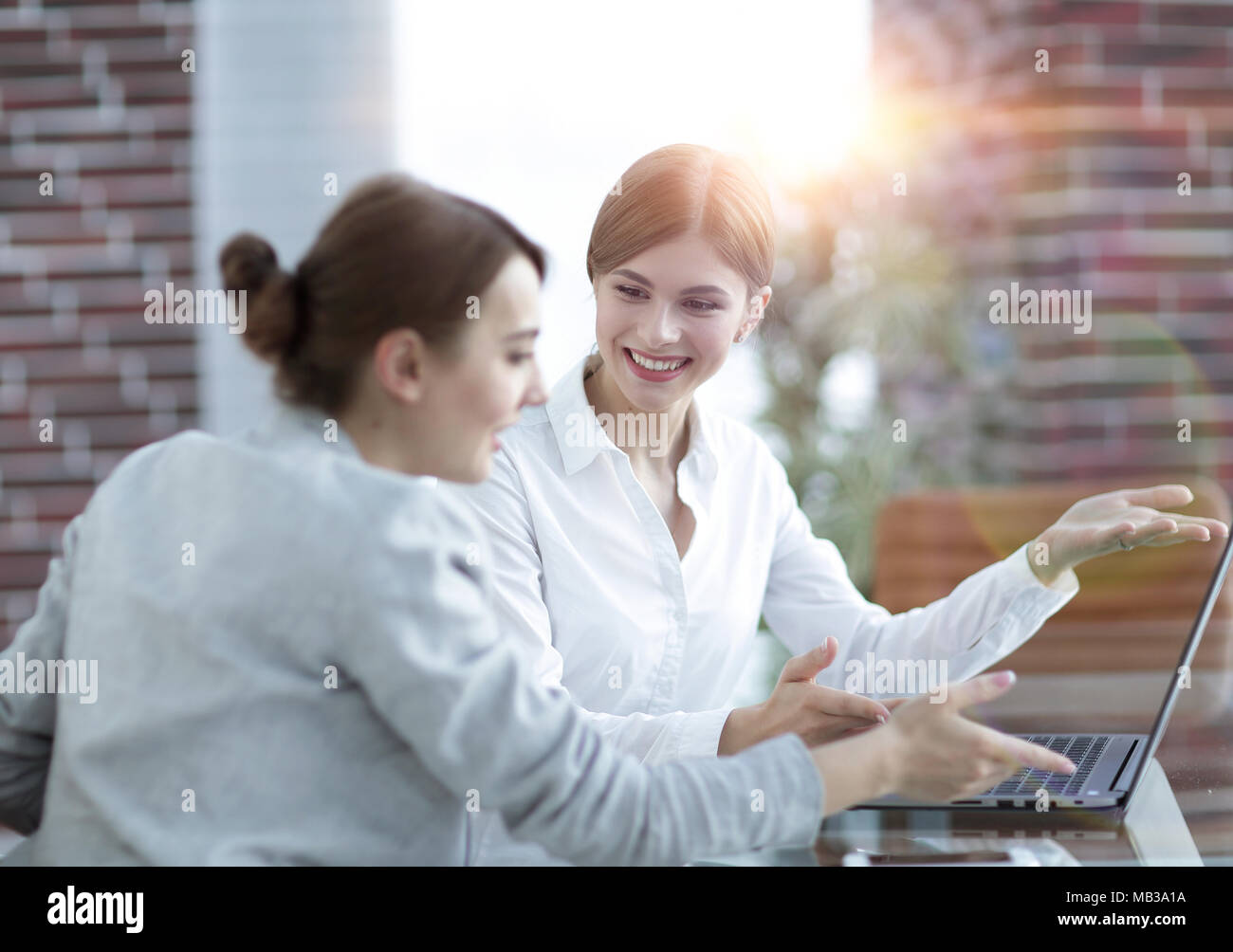 members of the business team working with laptop Stock Photo - Alamy