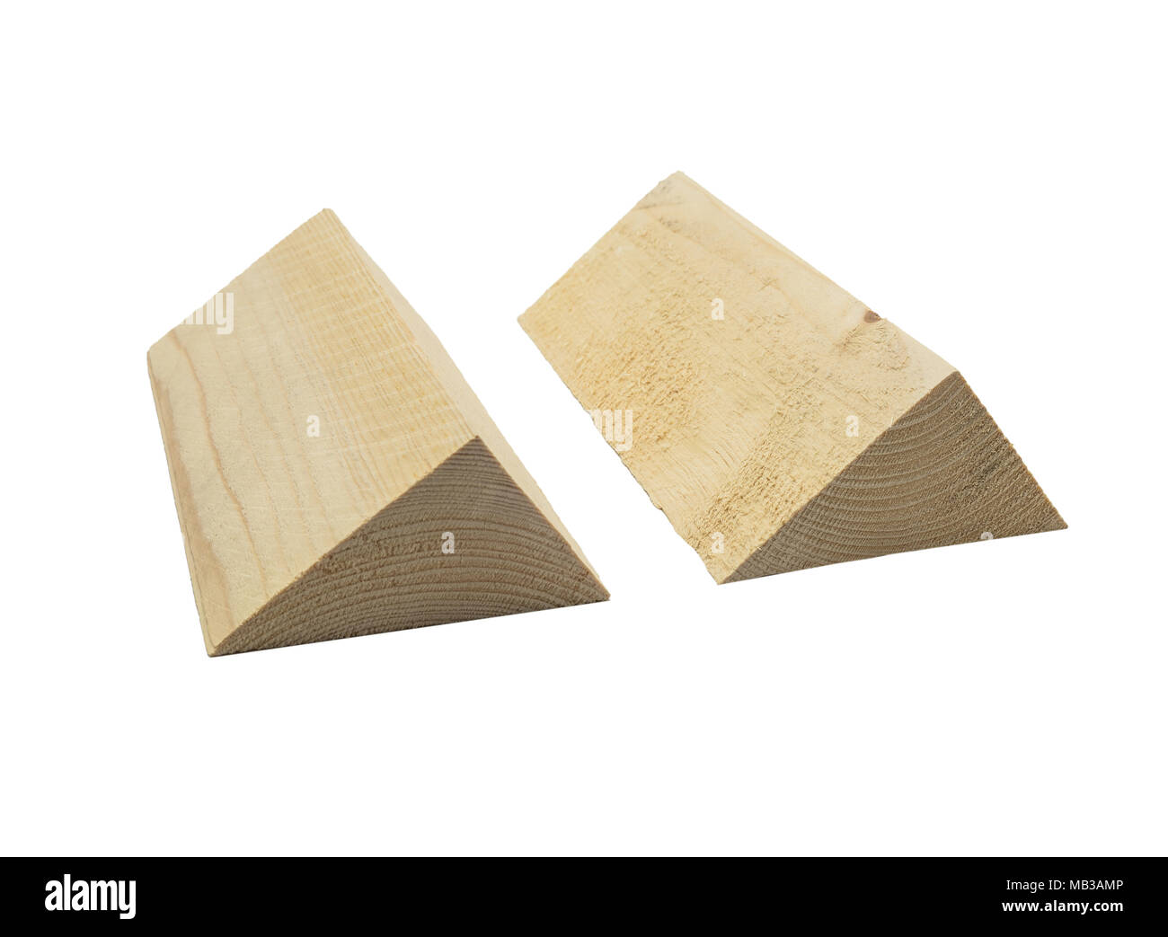 Two wooden wedges isolated on a white background Stock Photo - Alamy