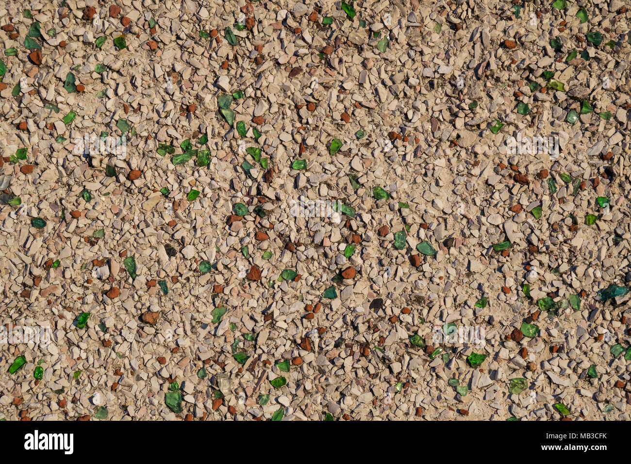 Closeup stucco with Colorful glass and small stone wall texture and ...