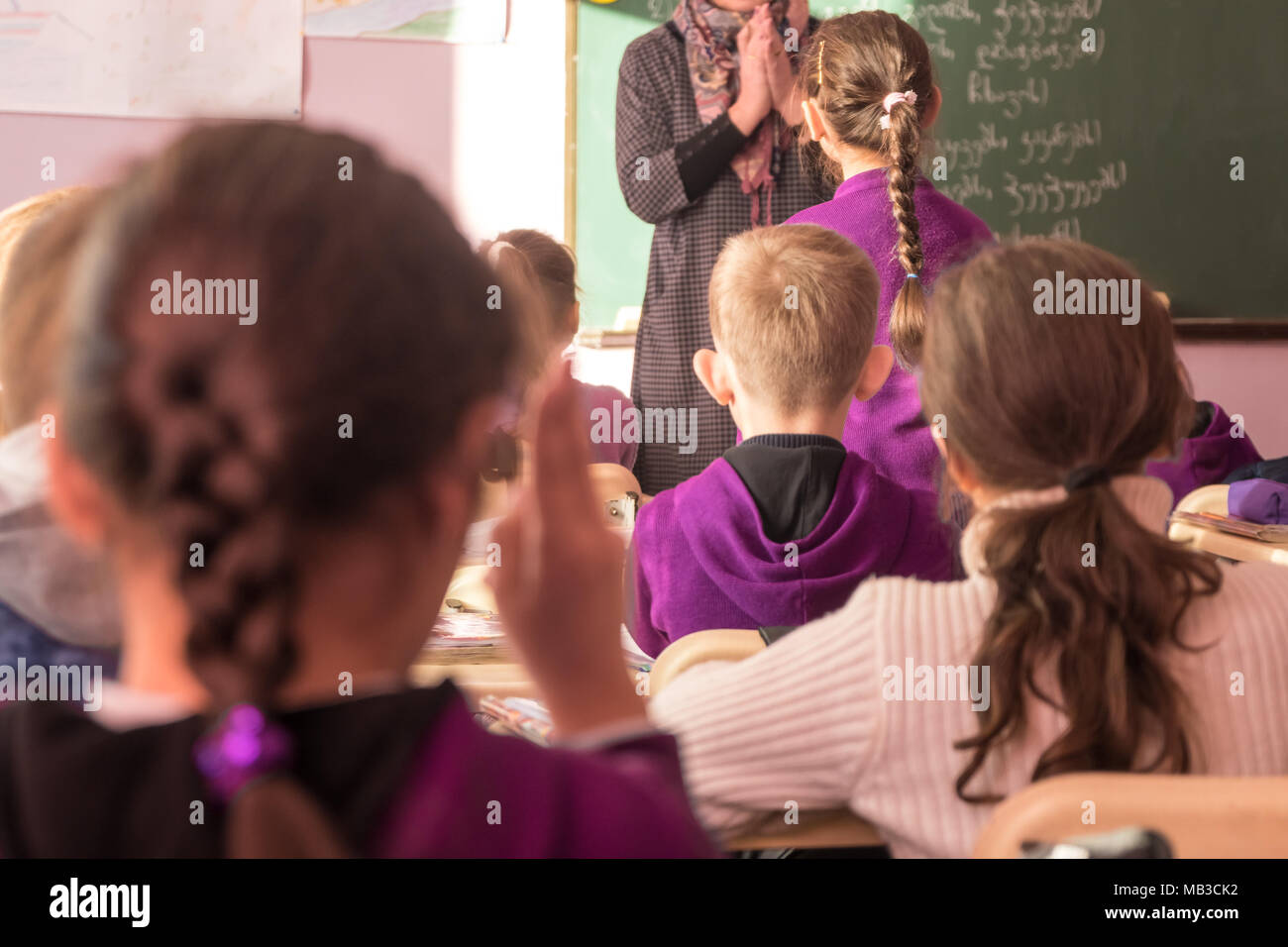 school children are participating actively in class Stock Photo - Alamy