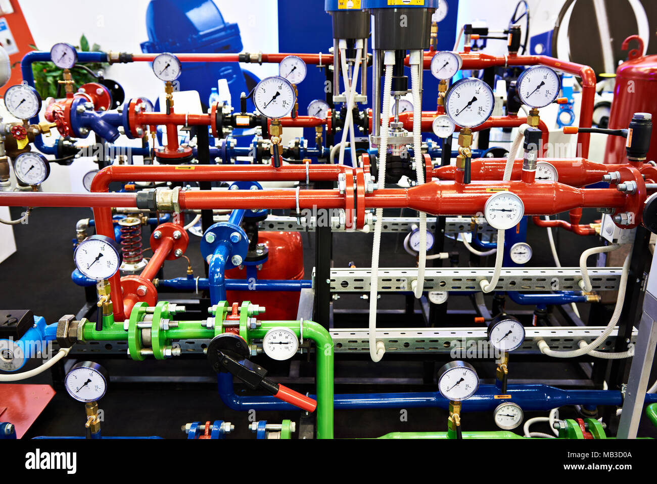 Colorful piping with manometers for industry Stock Photo - Alamy