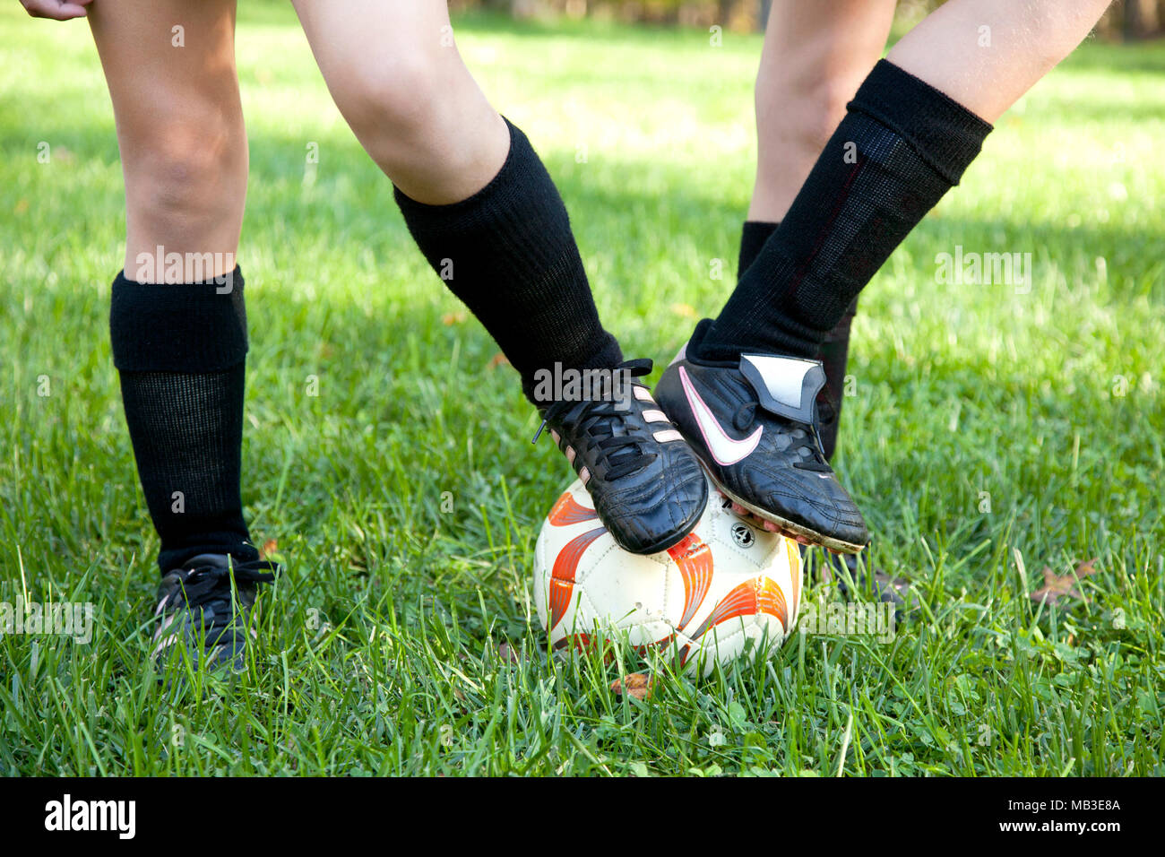Girl's Legs and Soccer Ball, Close-Up Stock Photo - Alamy