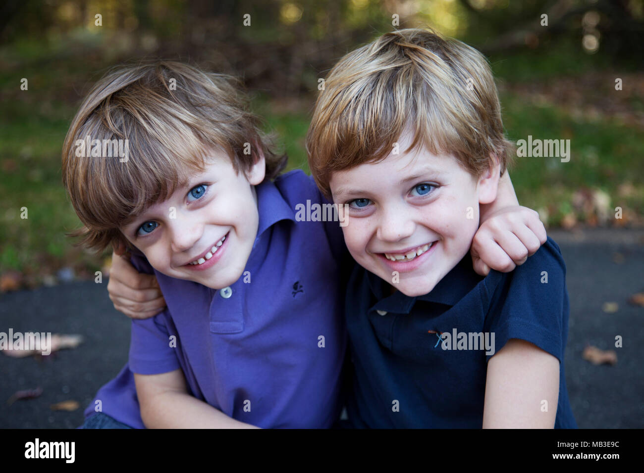 Two Young Boys Hugging Each Other Stock Photo - Alamy