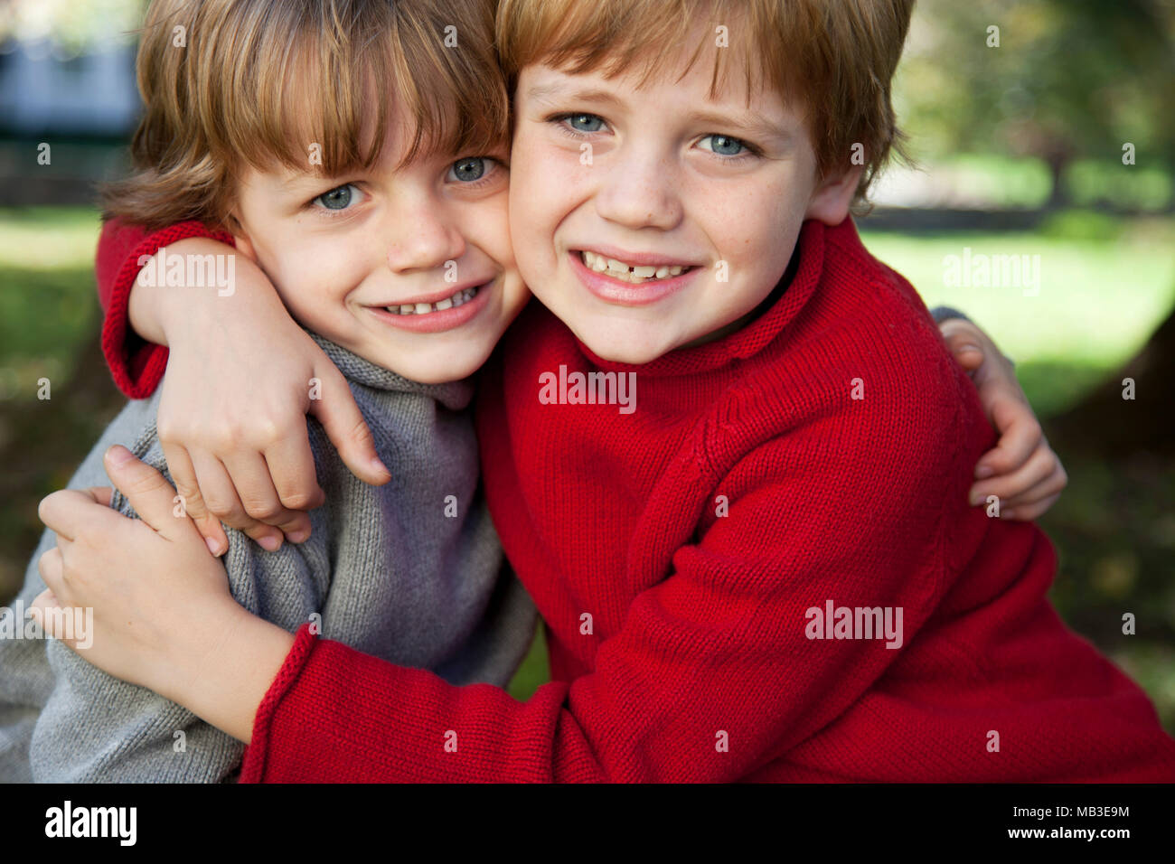 Two Young Boys Hugging Each Other Stock Photo - Alamy