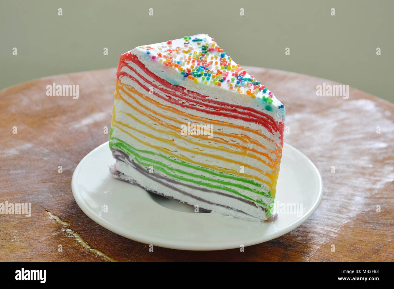 crape cake on dish near the window Stock Photo - Alamy