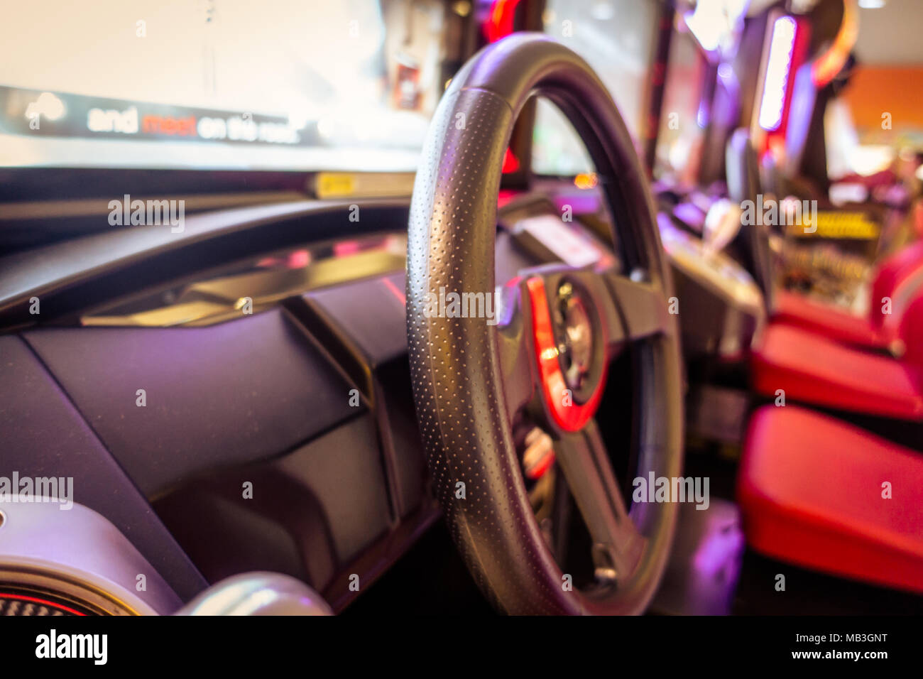 Wheel of a game console racing video game slot machines at an arcade ...