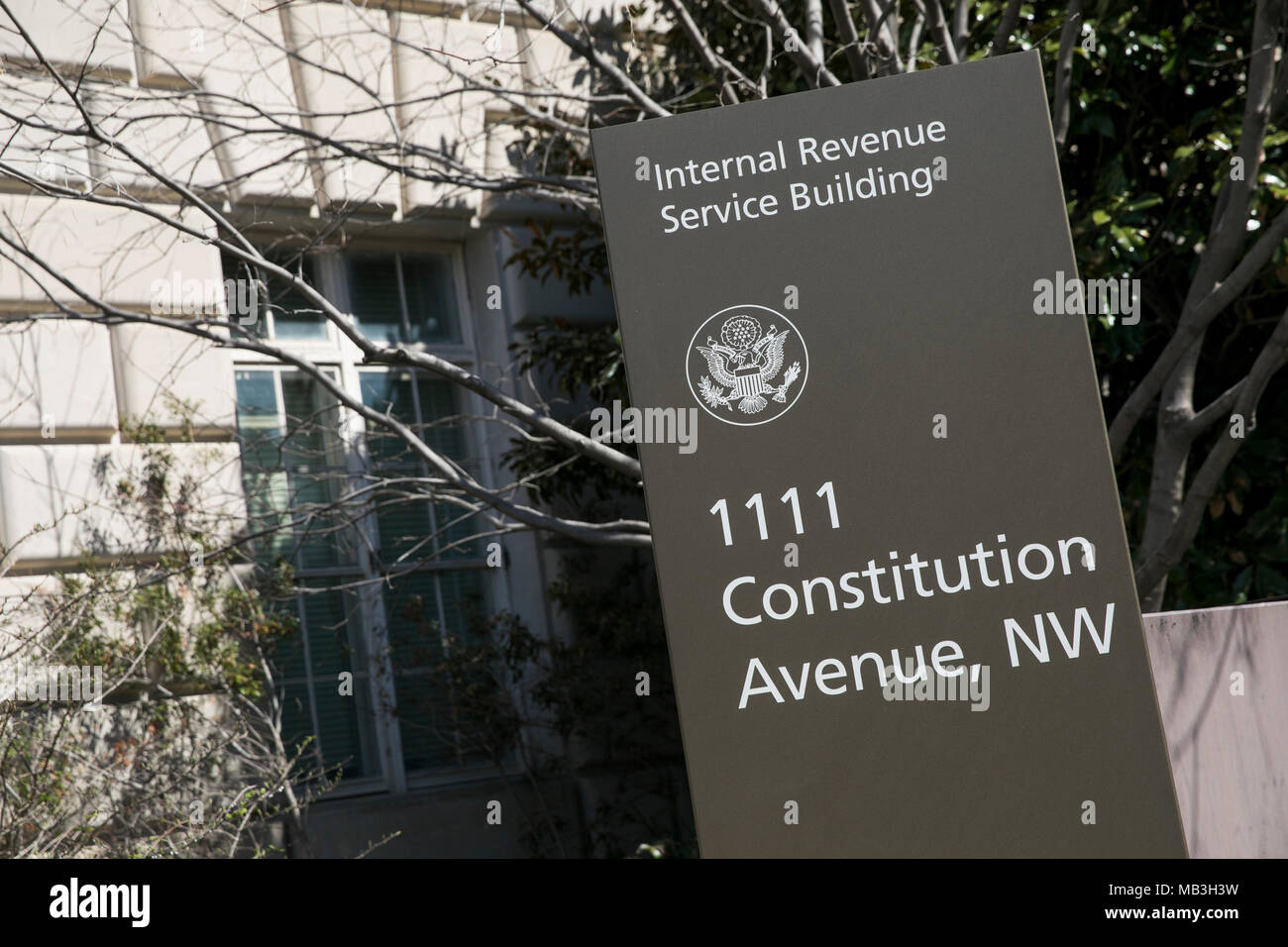 A logo sign outside of the headquarters of the Internal Revenue Service ...