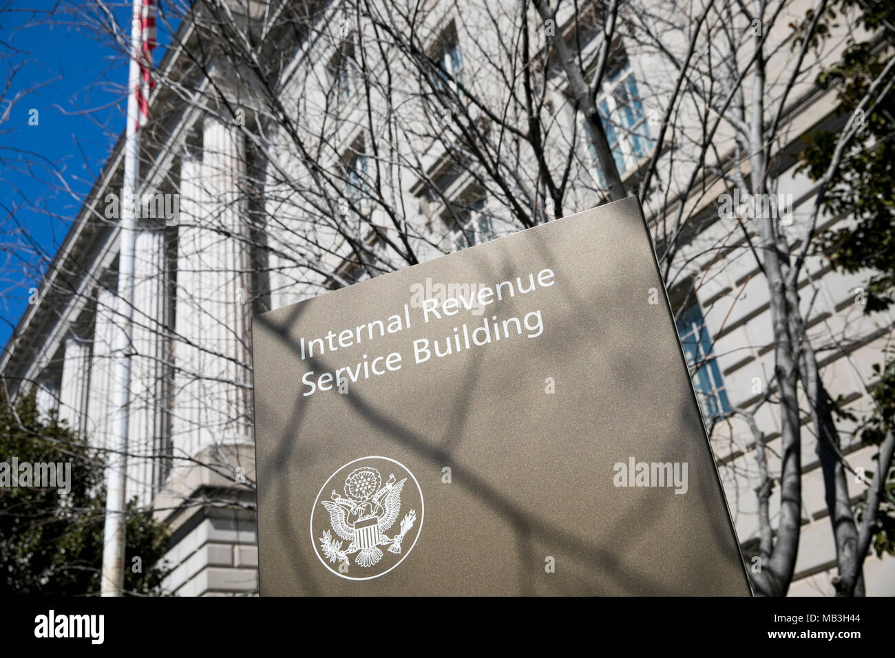 A logo sign outside of the headquarters of the Internal Revenue Service ...