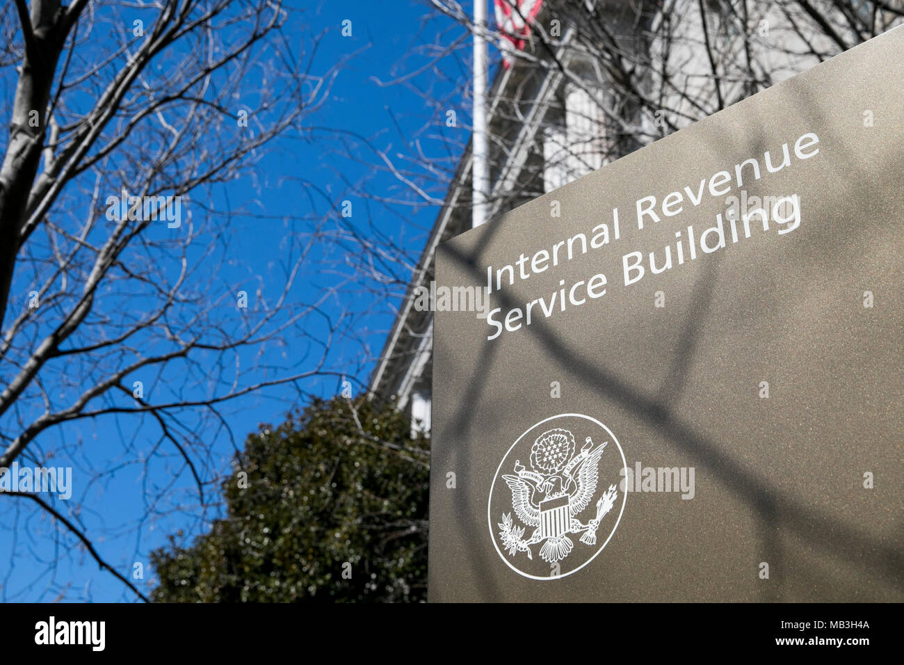 A logo sign outside of the headquarters of the Internal Revenue Service ...