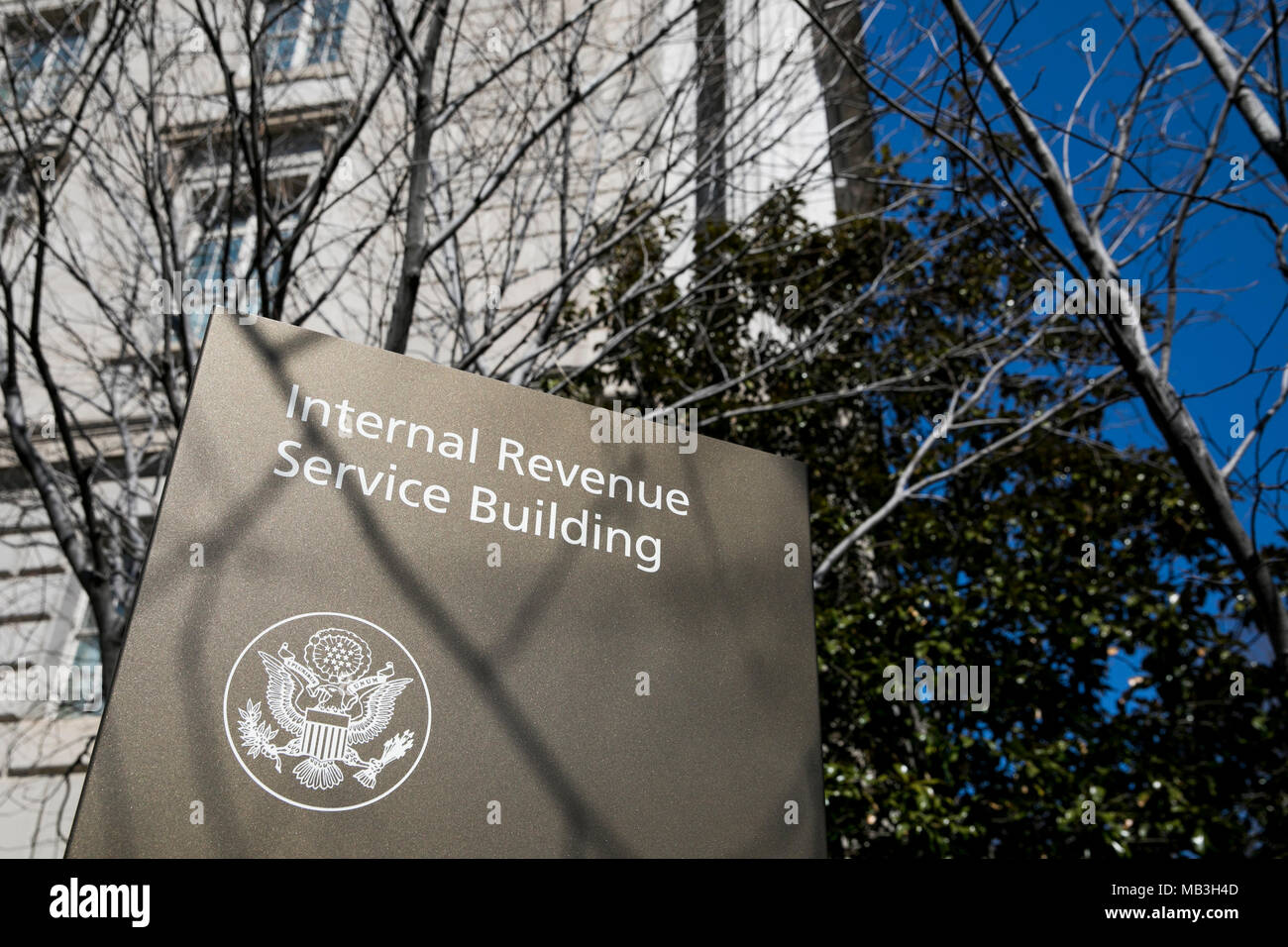 A logo sign outside of the headquarters of the Internal Revenue Service ...