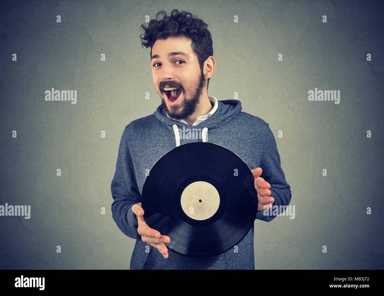 Man holding record album hi-res stock photography and images - Alamy