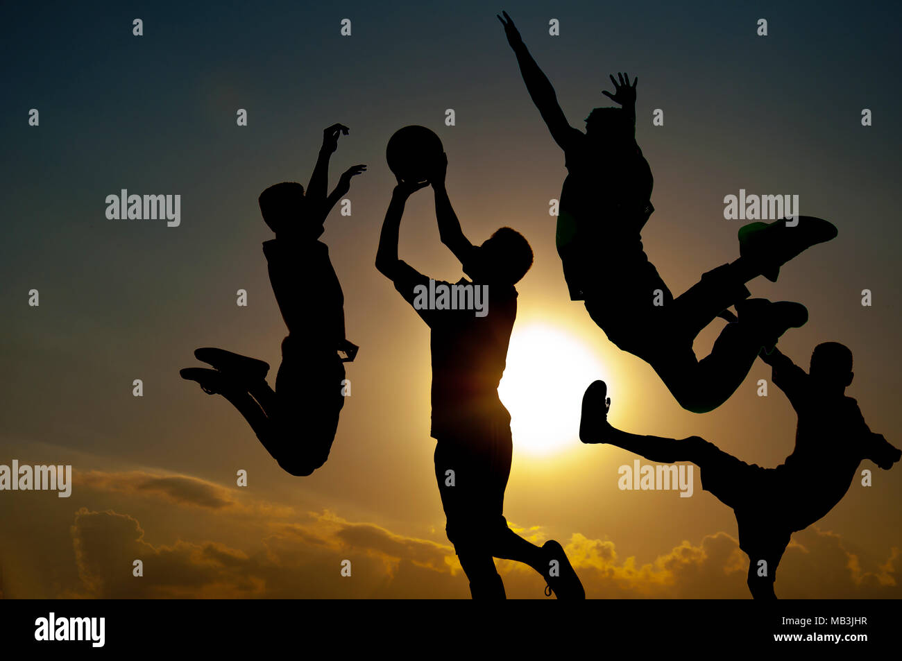 silhouette of man jumping for victory Stock Photo - Alamy