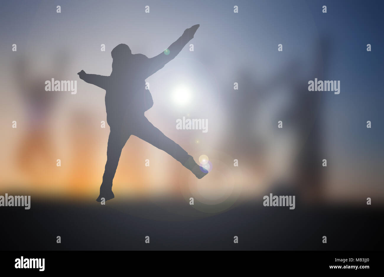 silhouette of man jumping for victory Stock Photo - Alamy