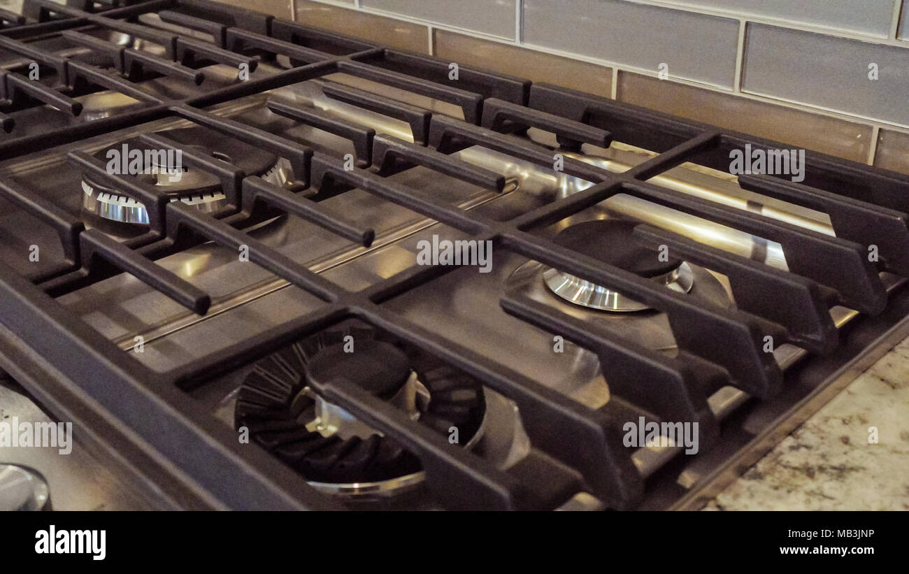 Modern gas stove in luxury house Stock Photo - Alamy