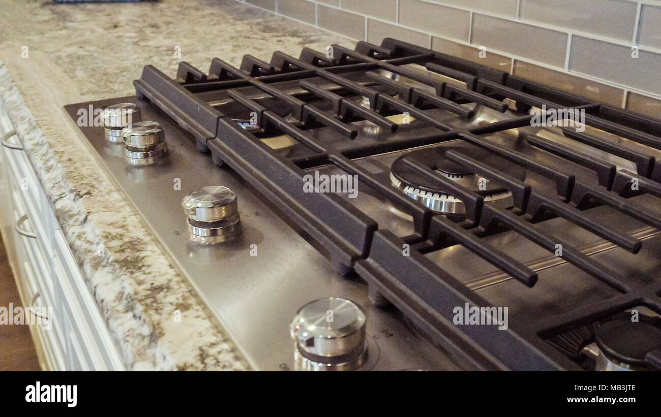 Modern gas stove in luxury house Stock Photo - Alamy