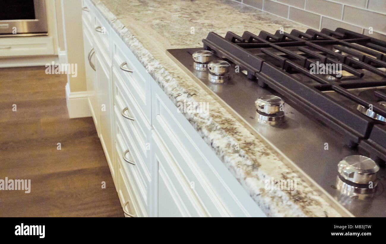 Modern gas stove in luxury house Stock Photo - Alamy