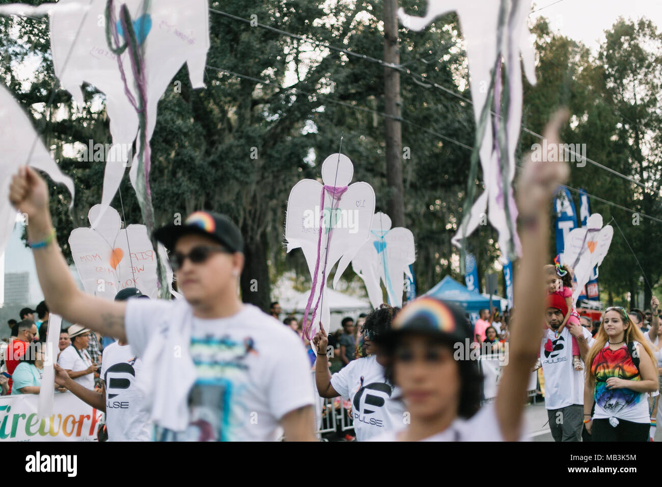 Pulse supporters march in Orlando Pride Parade with angels to remember ...
