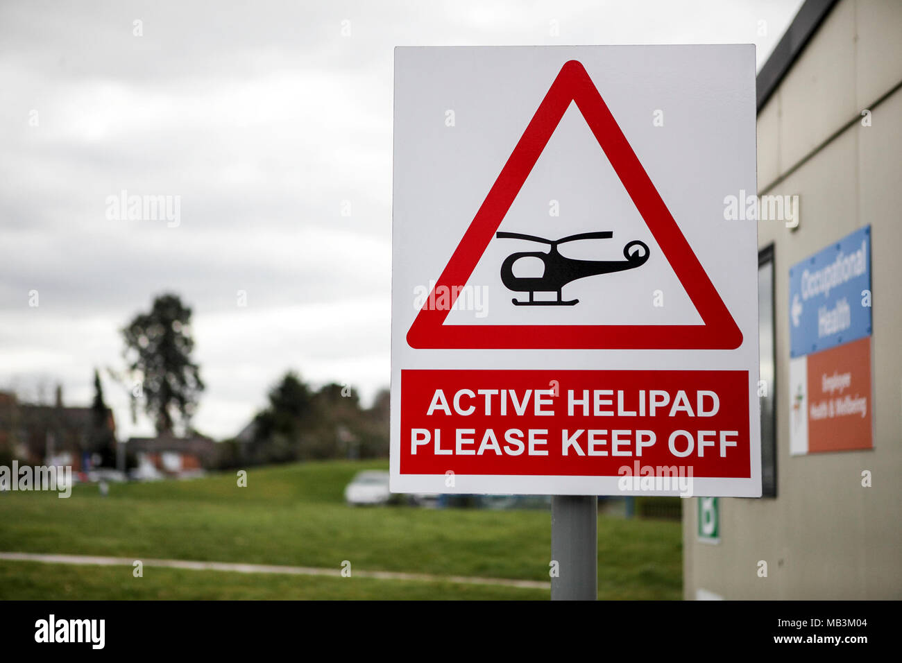 Warning sign indicating helipad at Shrewsbury Hospital Stock Photo - Alamy