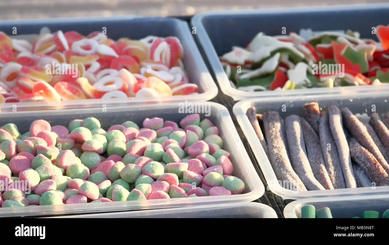 Plastic box with jelly sweets in candy shop Stock Photo - Alamy
