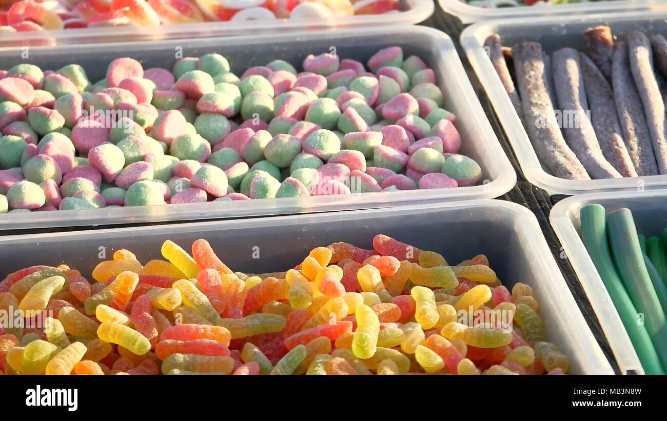 Plastic box with jelly sweets in candy shop Stock Photo - Alamy