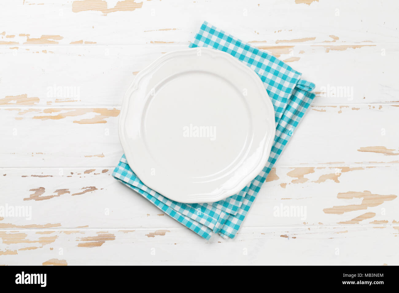 Empty plate on wooden table. Top view with space for your meal or ...