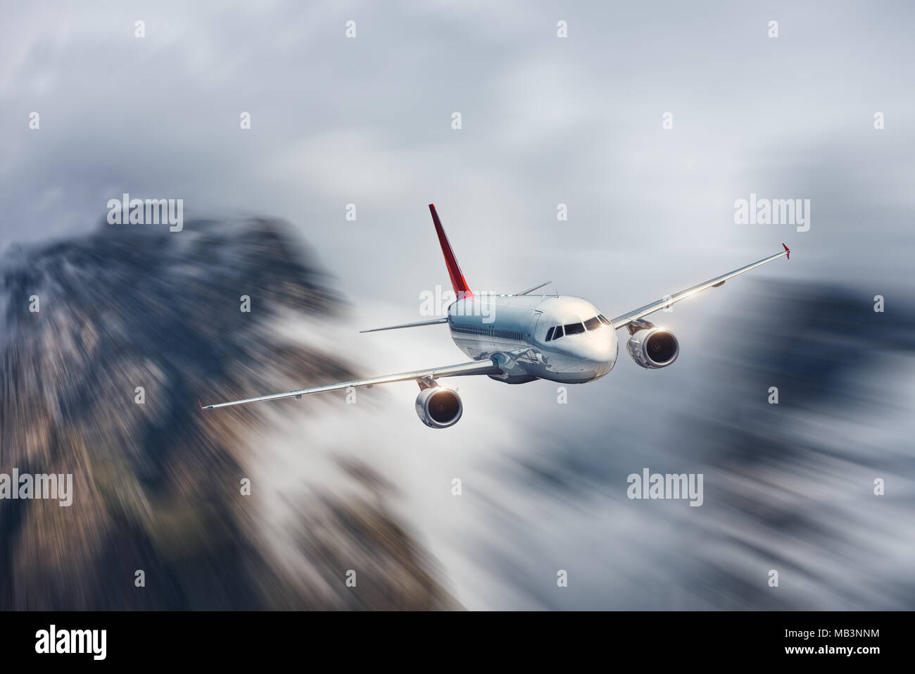 Airplane in motion. Aircraft with motion blur effect is flying in ...