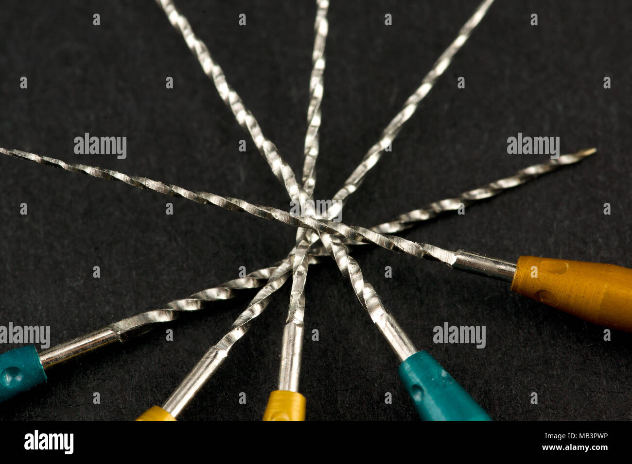 Tools for dentist work in the root canals of teeth Stock Photo - Alamy