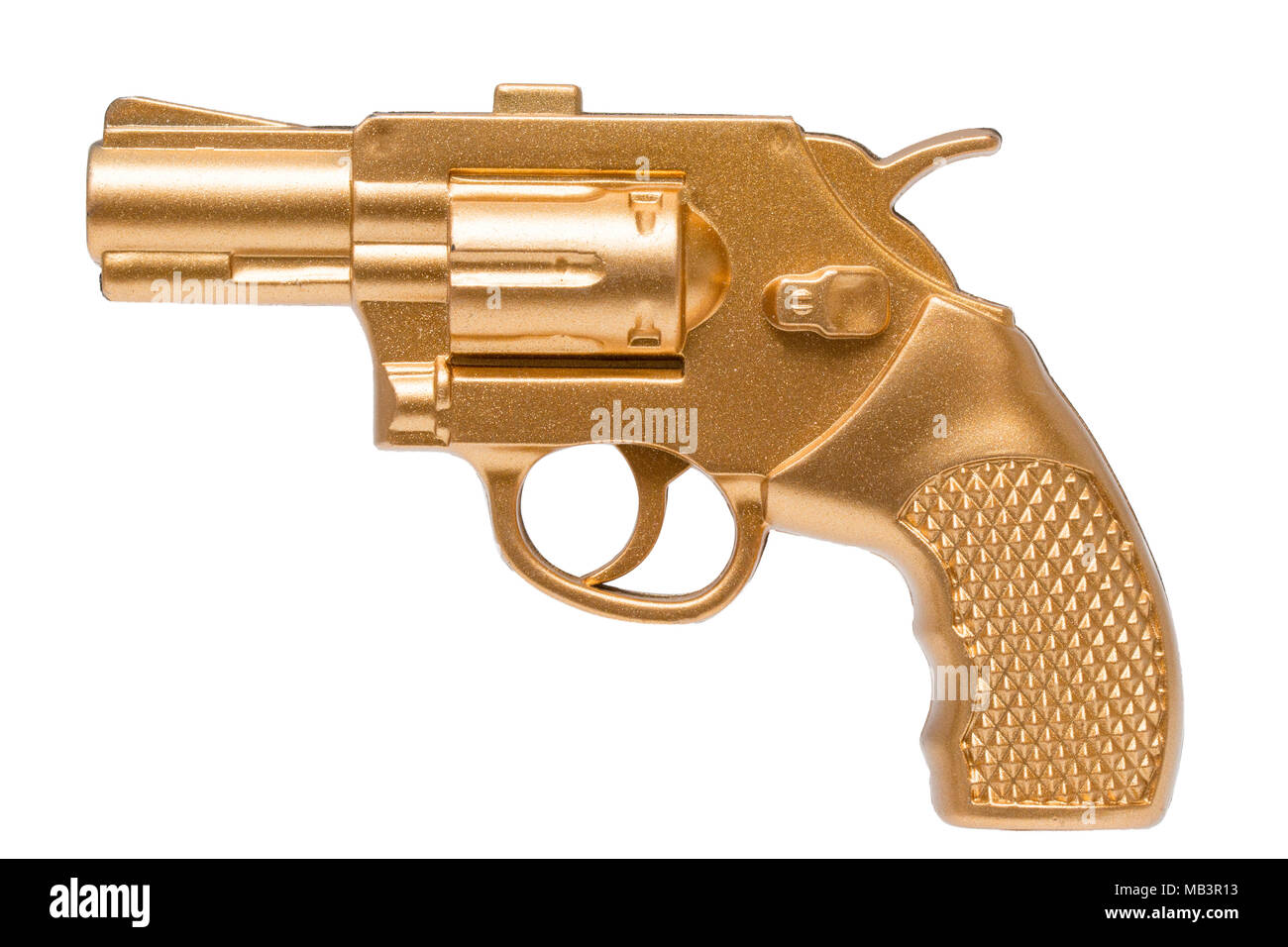 Golden toy gun Stock Photo - Alamy