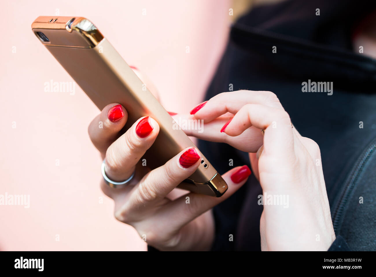 Female hands texting on smartphone, nicely manicured fingernails Stock ...