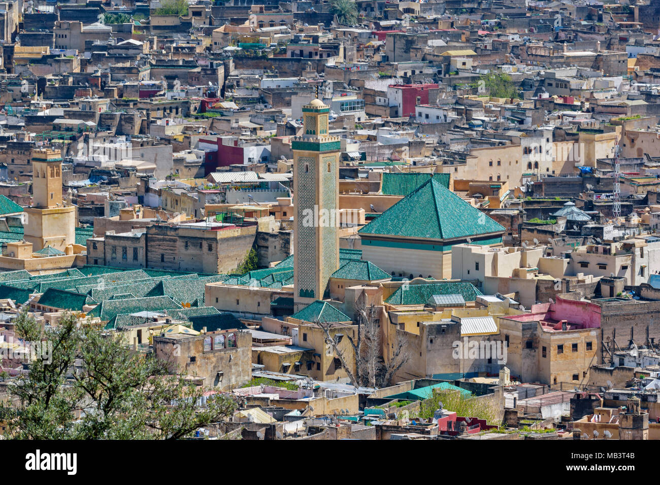 MOROCCO FES MEDINA SOUK DETAIL OF THE GREEN ROOFS AND TWO MINARETS OF ...