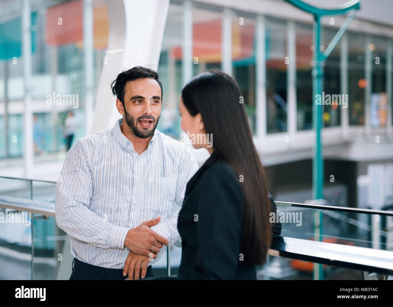 Business colleagues talking together outdoor Stock Photo - Alamy