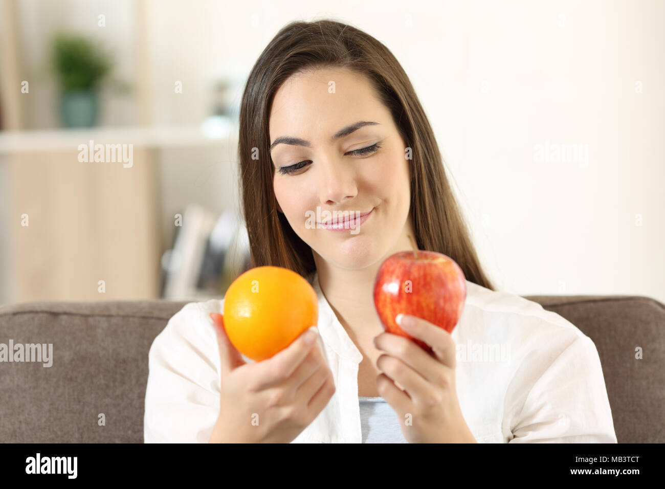 Holding apple with two hands hi-res stock photography and images - Alamy