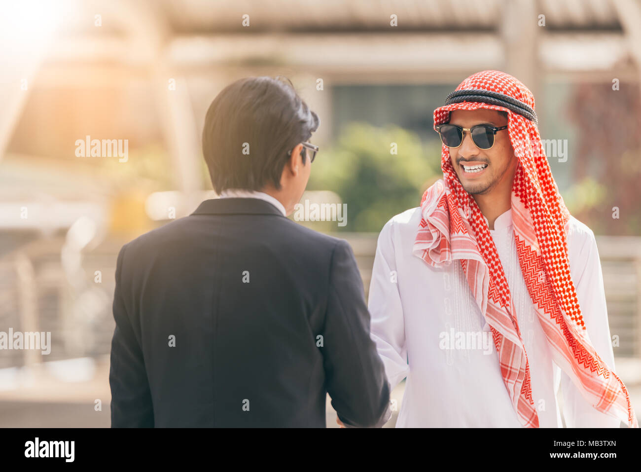 handshake concept.Arabic business and Businessman shaking hands Stock ...
