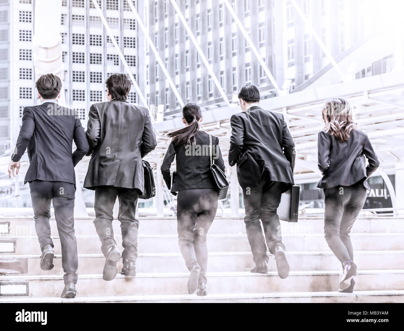 Business people running in city Stock Photo - Alamy