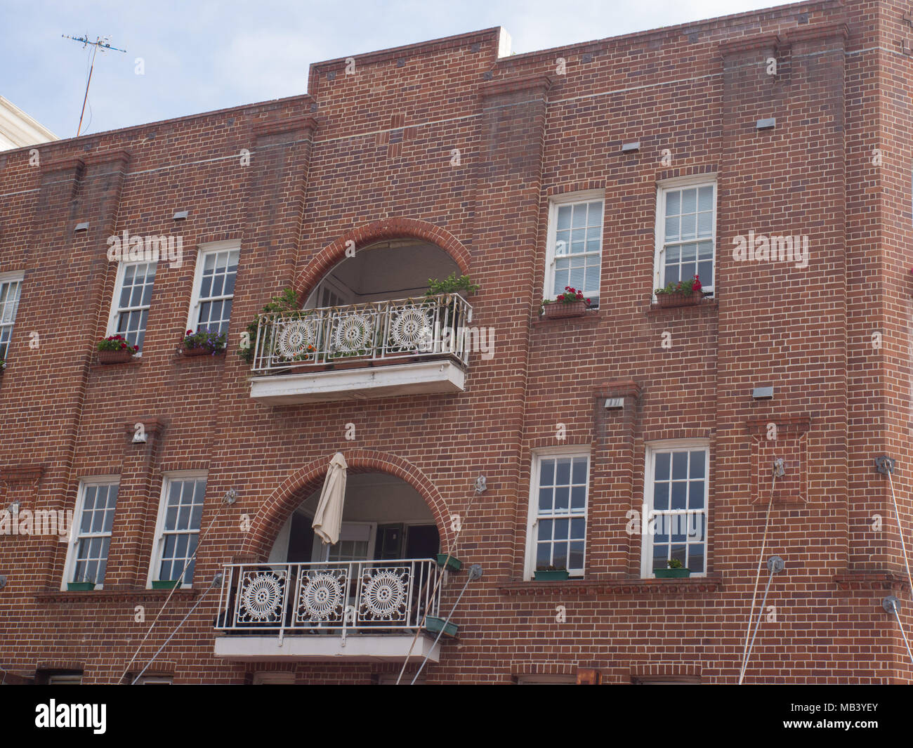 Multi Storey Brick Building Exterior Stock Photo - Alamy