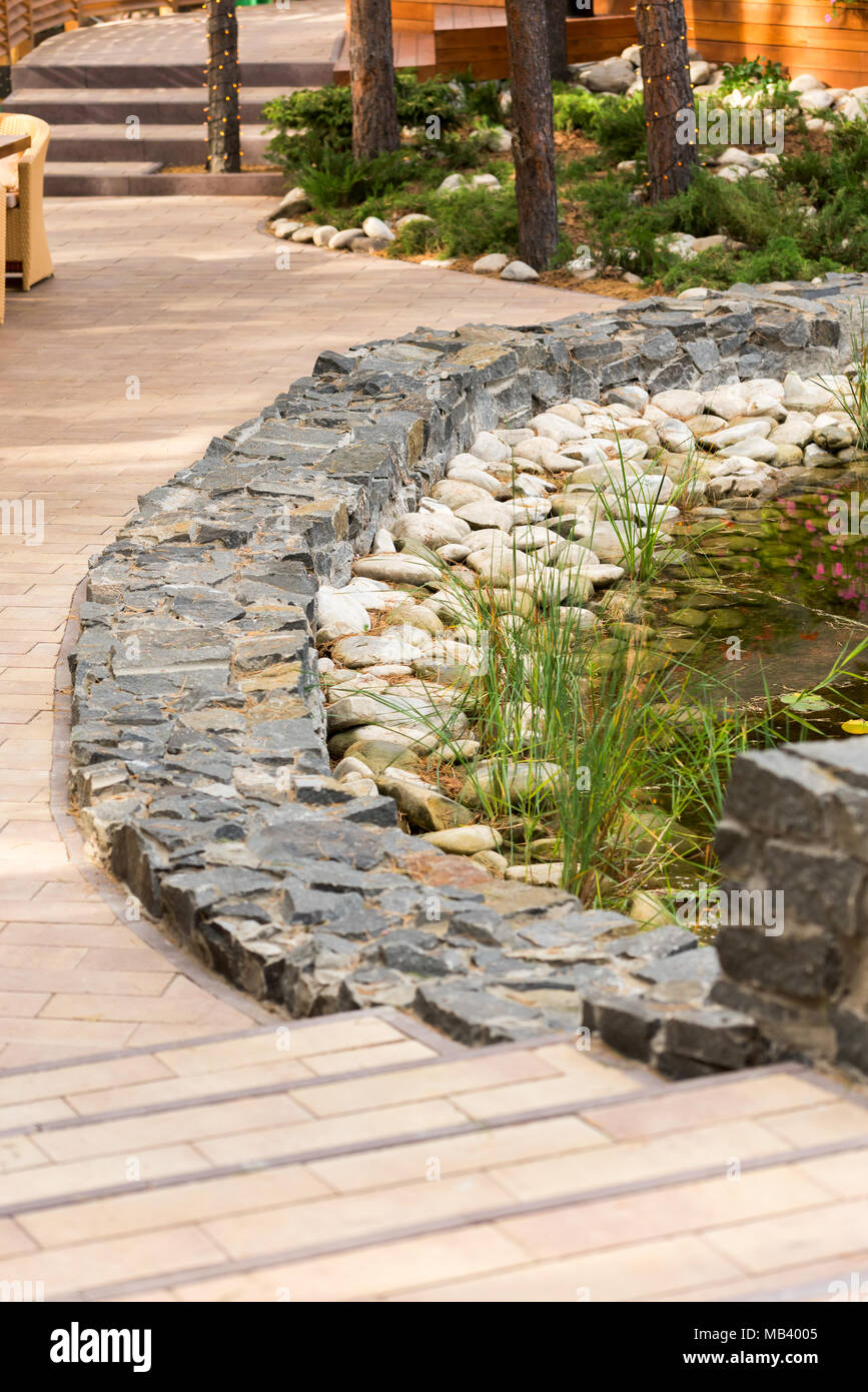 Landscape design the manufacture of granite stone laying an artificial ...