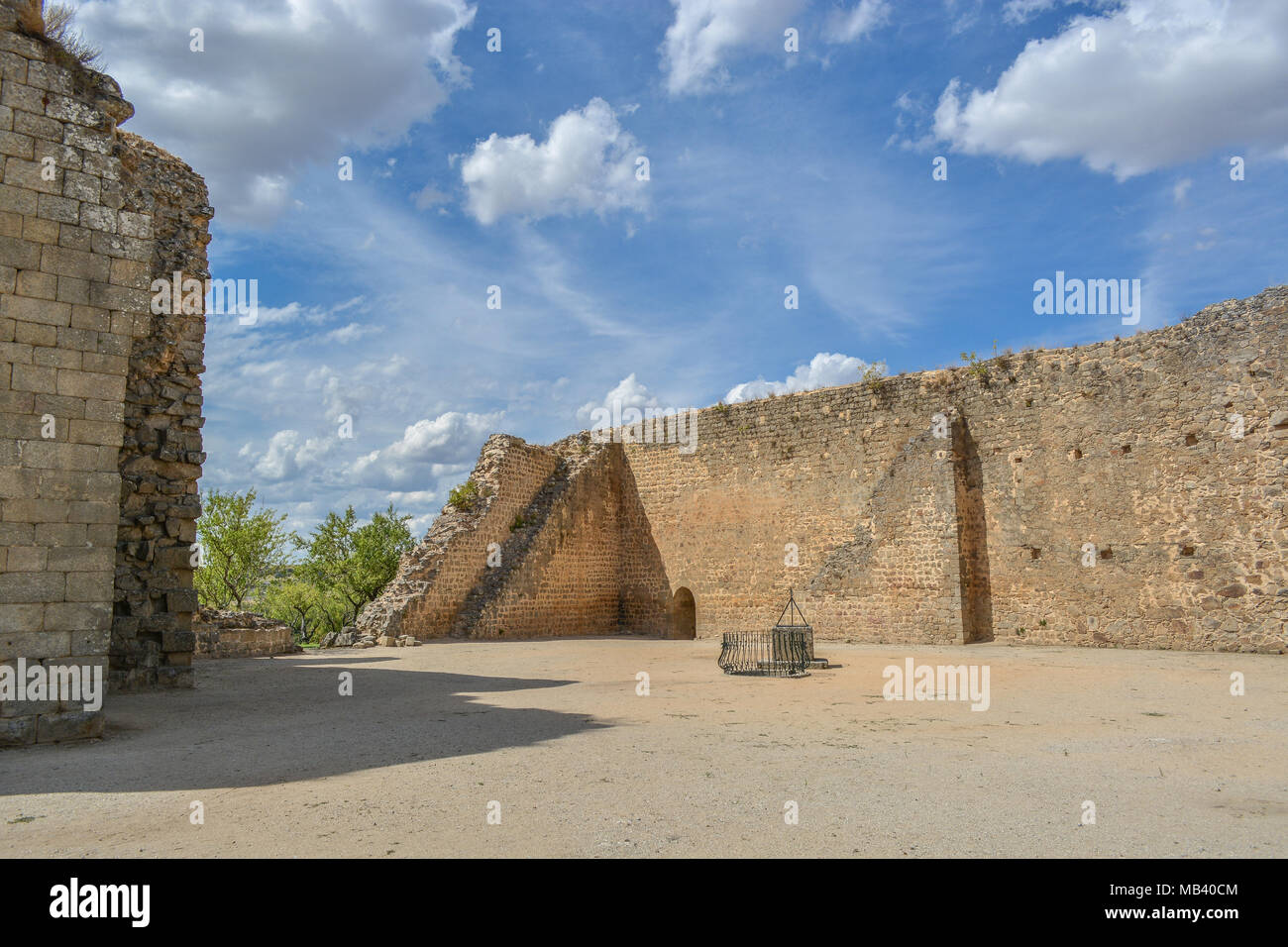 Medieval garden with fortress walls stone ruins Stock Photo - Alamy